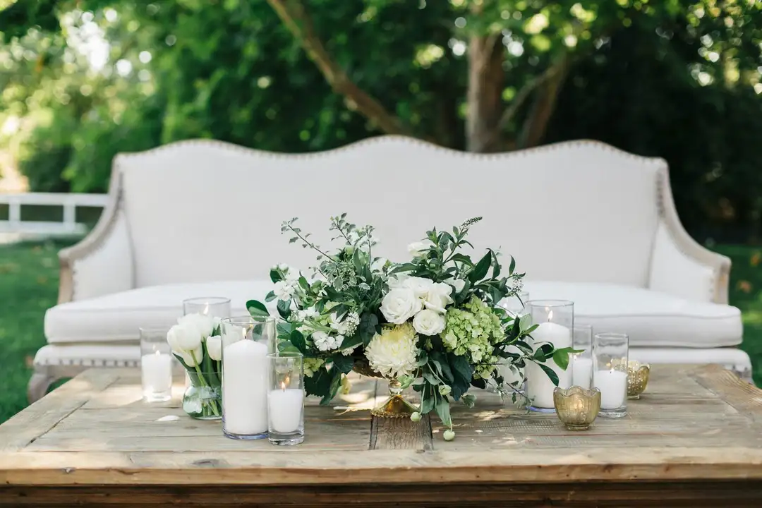 Wood Table with Greenery Arrangement